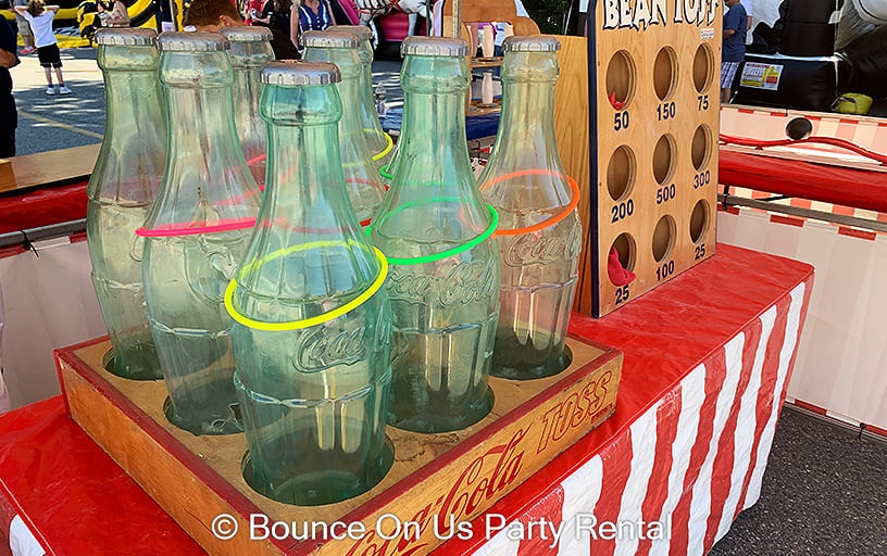 Bottle Toss Carnival Game (Pepsi & Coca Cola bottles) - Bounce House ...